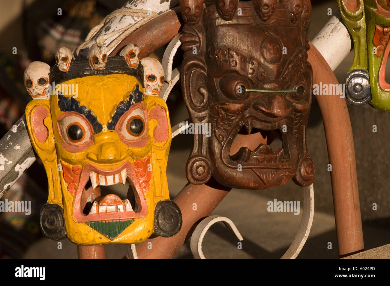 Traditional demon like mask in tourist gift shops in city center of Leh ...