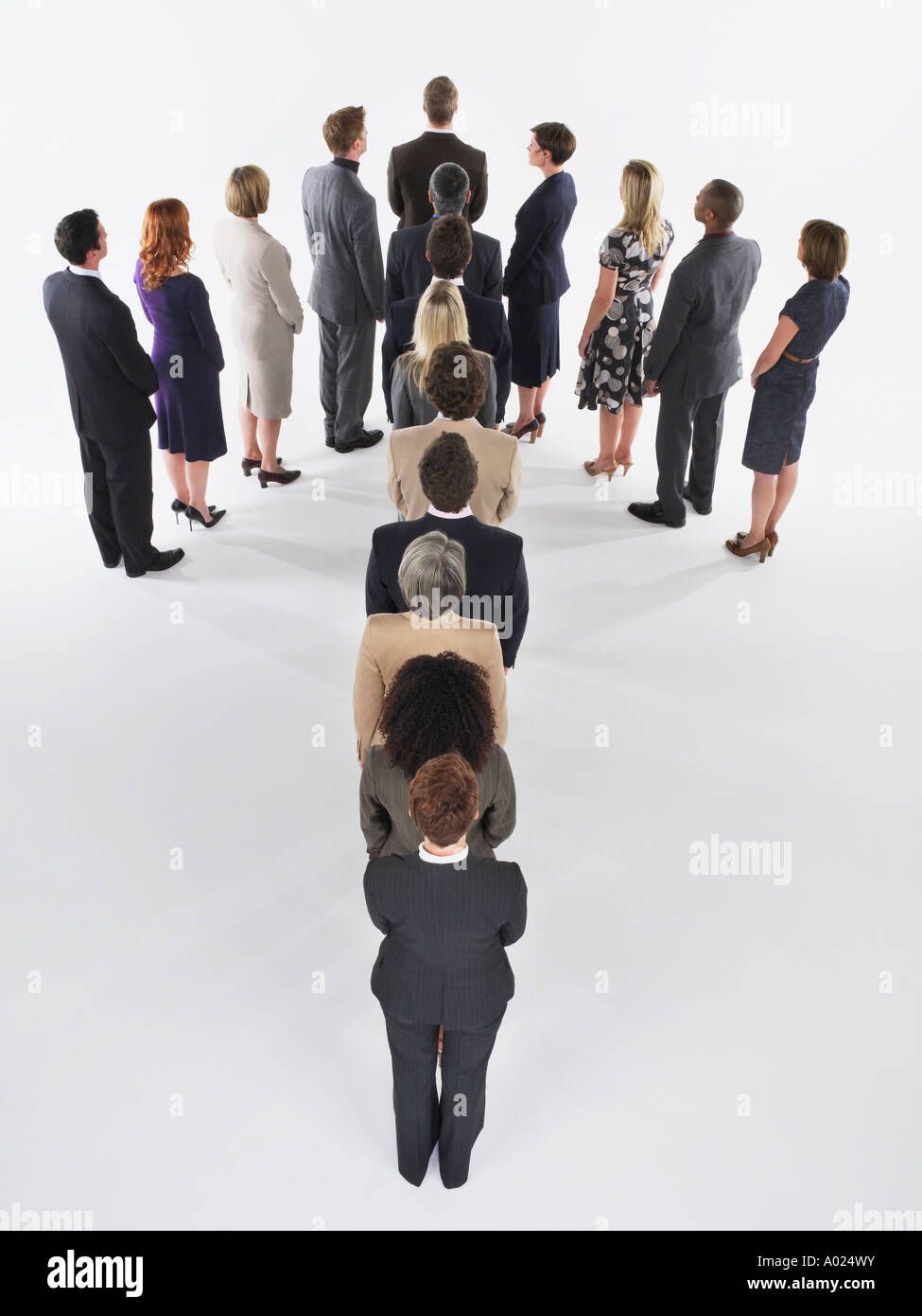 Large group of people in the shape of an arrow hi-res stock photography ...