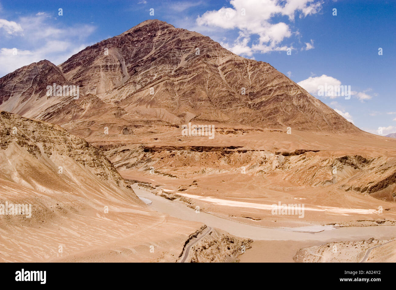 Yellow canyon gorge of Indus river near Leh with mountain and blue ...