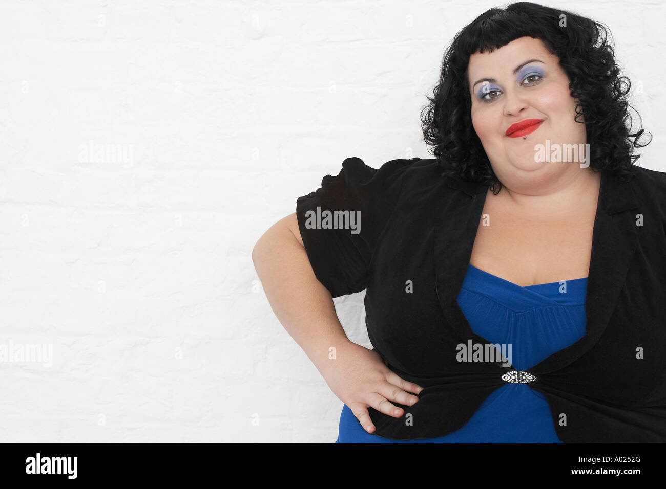Overweight Woman posing and Smiling, portrait Stock Photo - Alamy