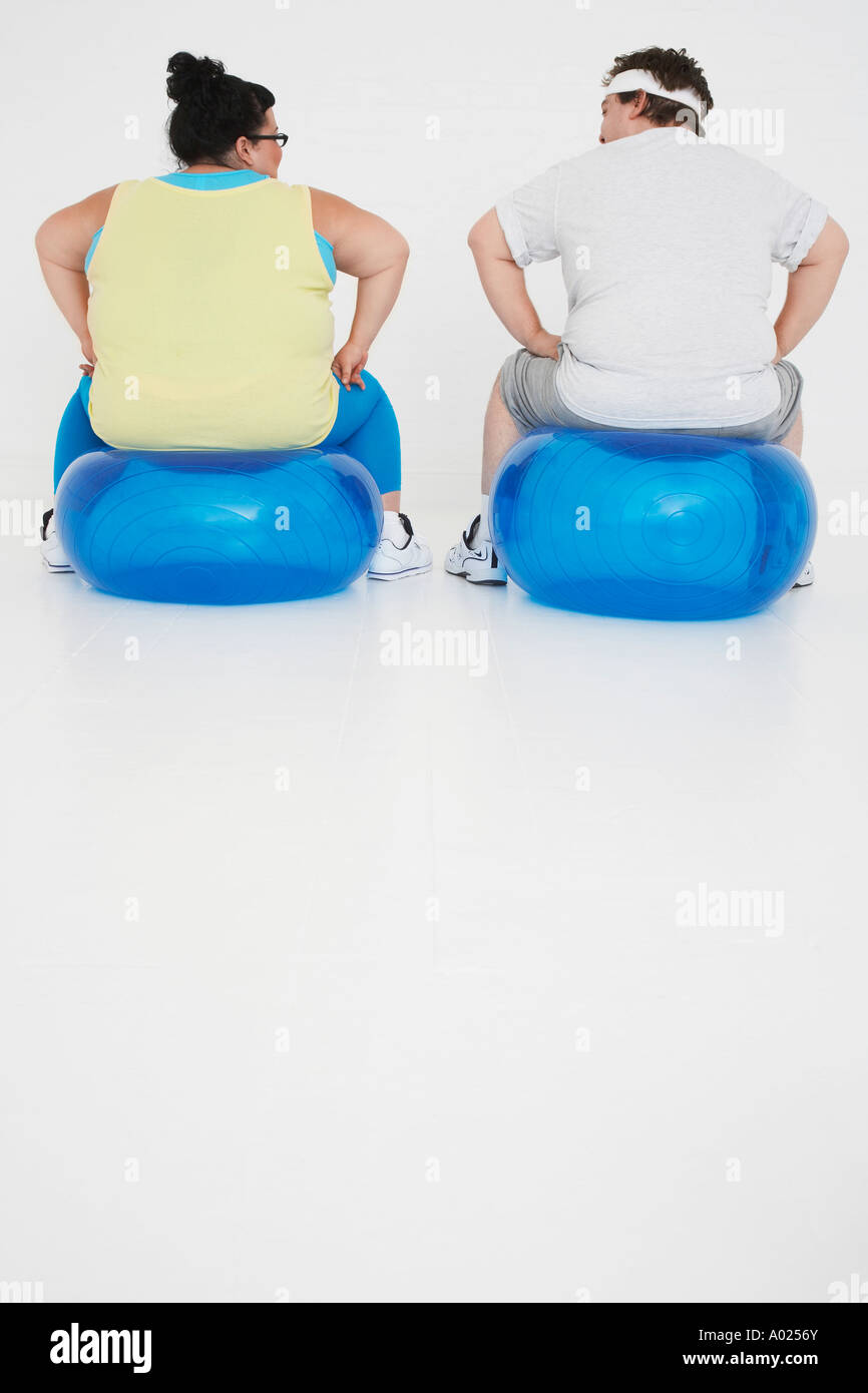 Back fat man sitting on hi-res stock photography and images - Alamy