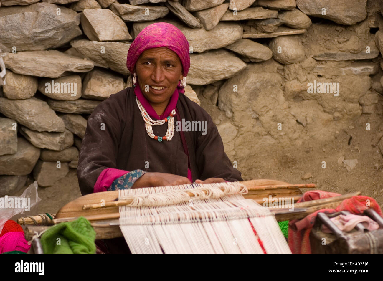 Mid ages Ladakhi woman weaving Rupshu valley near Tso Moriri Lake ...