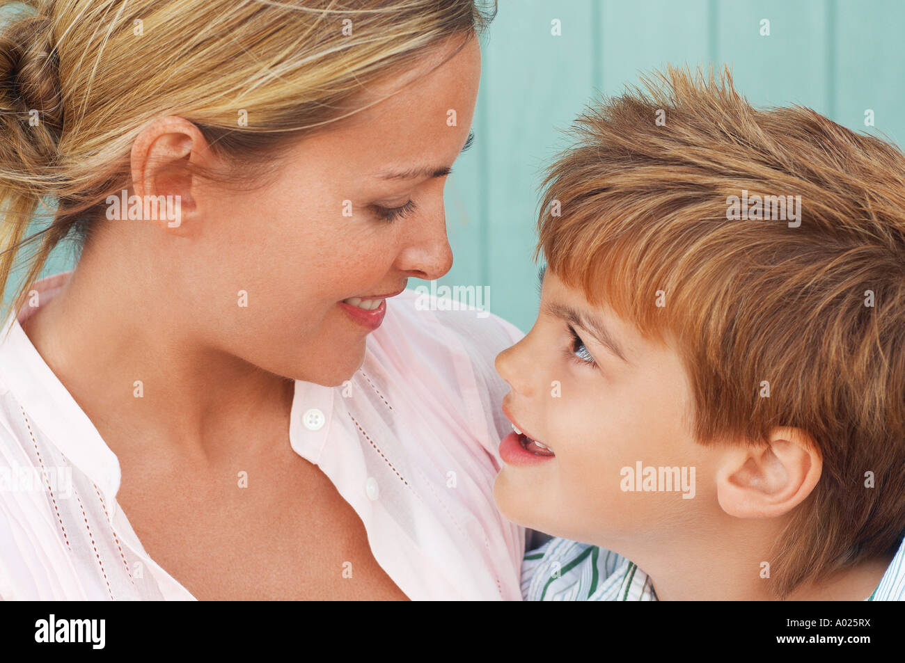 Mother brown hair son blonde hair hi-res stock photography and images ...