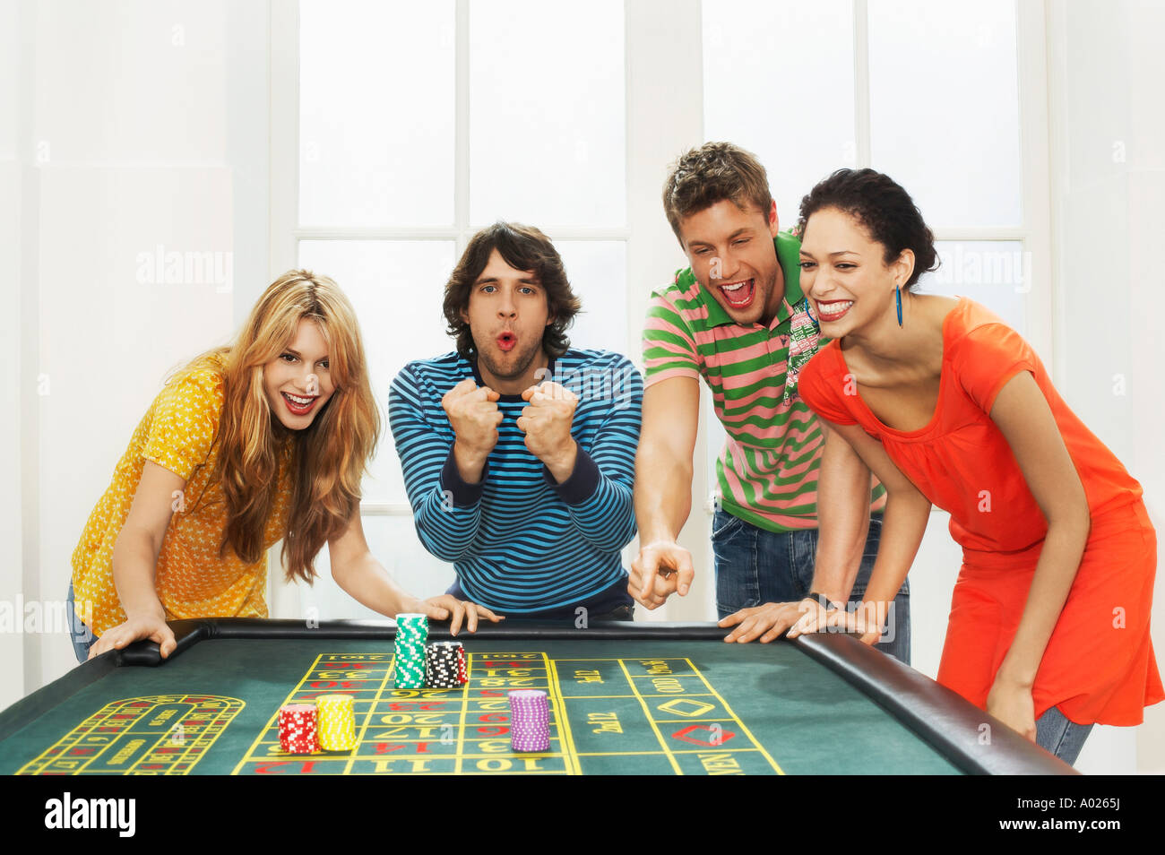 Celebrating half length gesturing hi-res stock photography and images ...