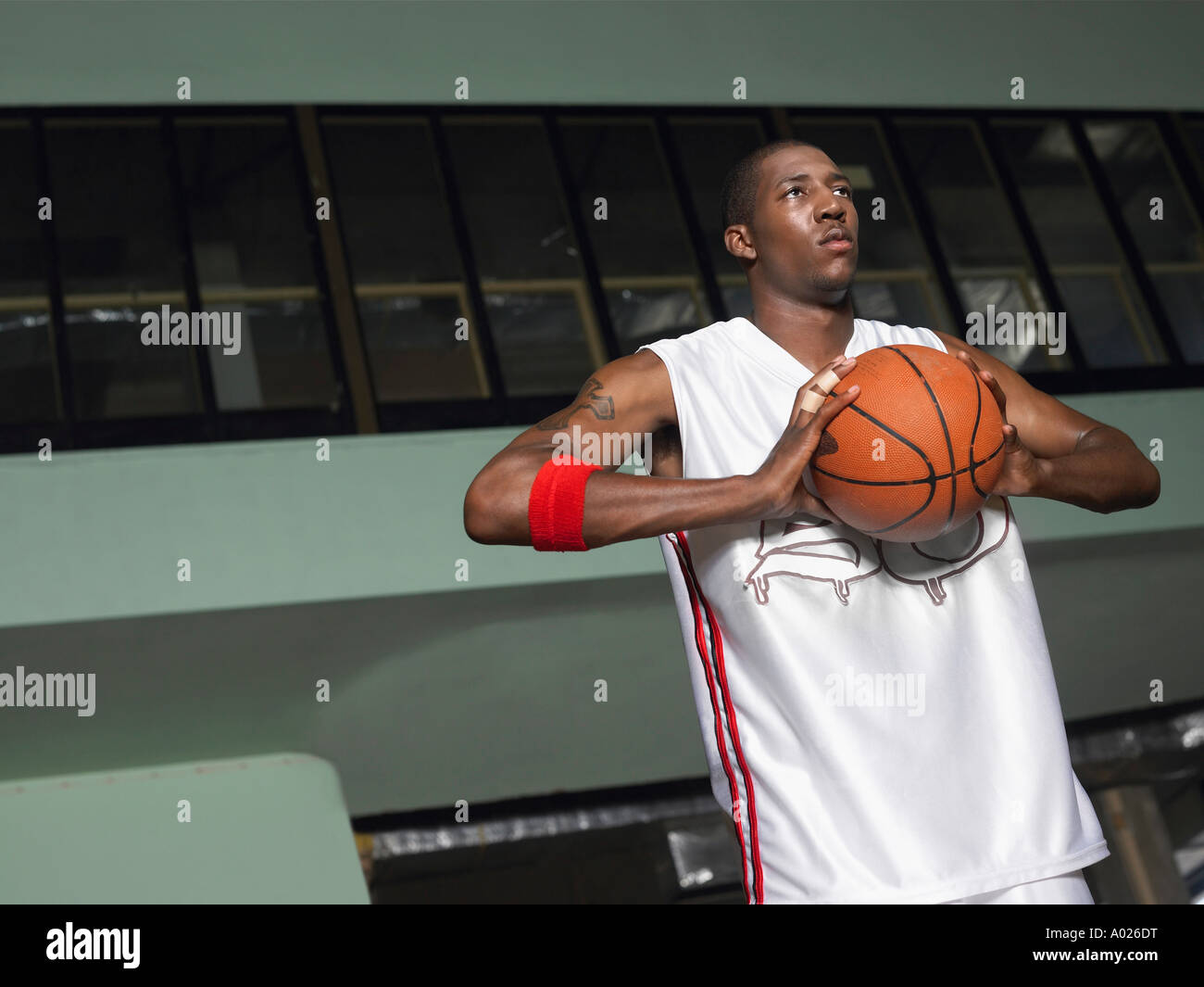 Basketball player preparing to pass ball, portrait Stock Photo - Alamy