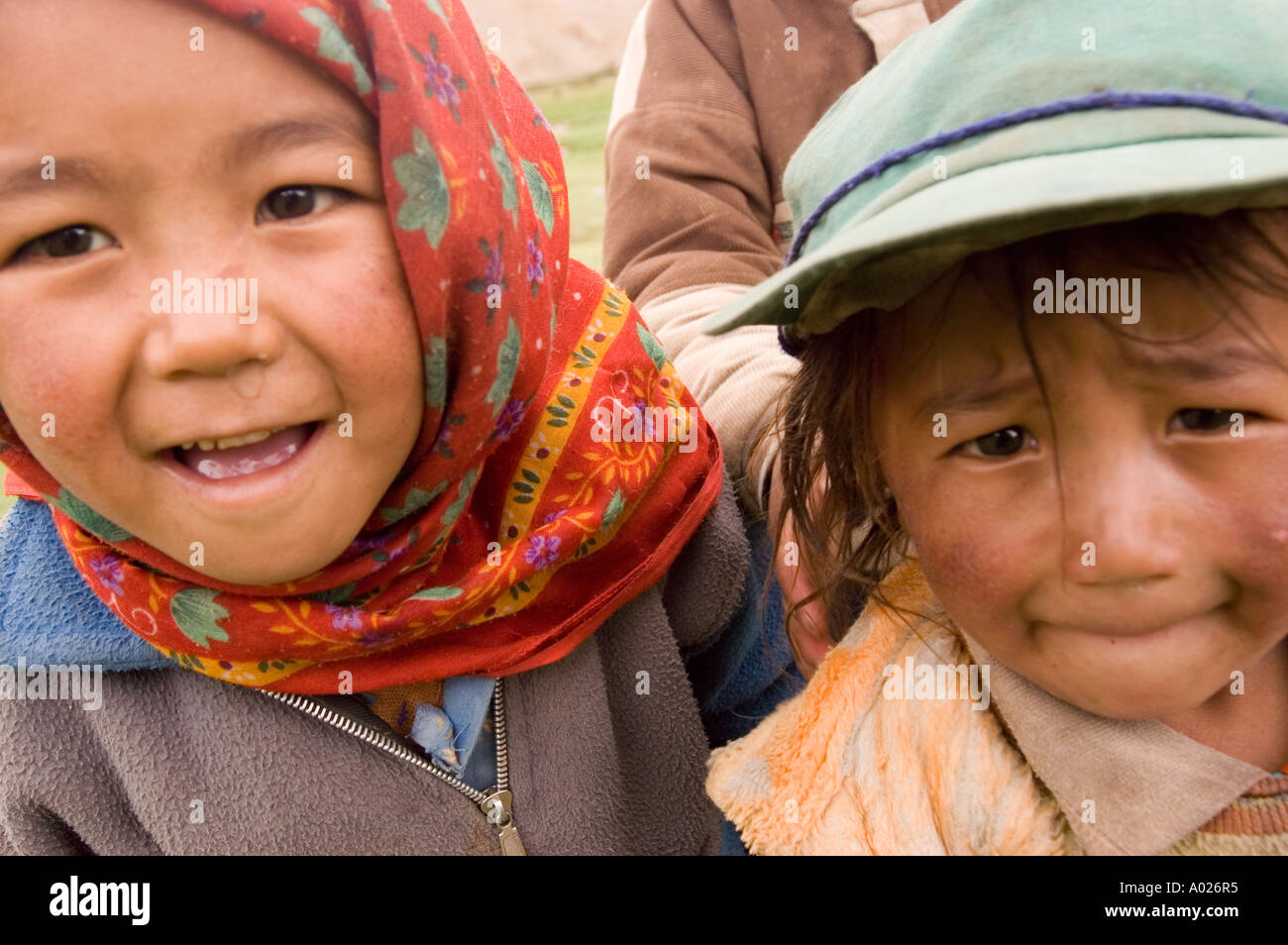Portrait of curious Ladakhi nomadic children Rupshu Valley Ladakh India ...
