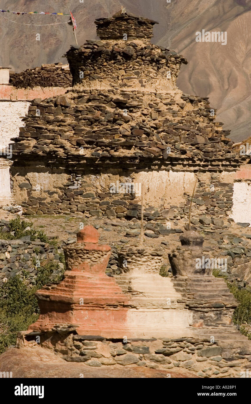 Three small colorful stupas in front of the bigger one Karsha village ...