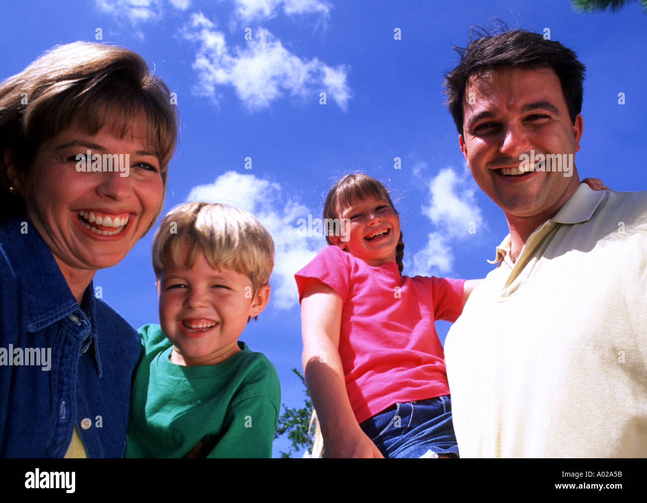Abstract portrait of family with children outdoors Stock Photo - Alamy