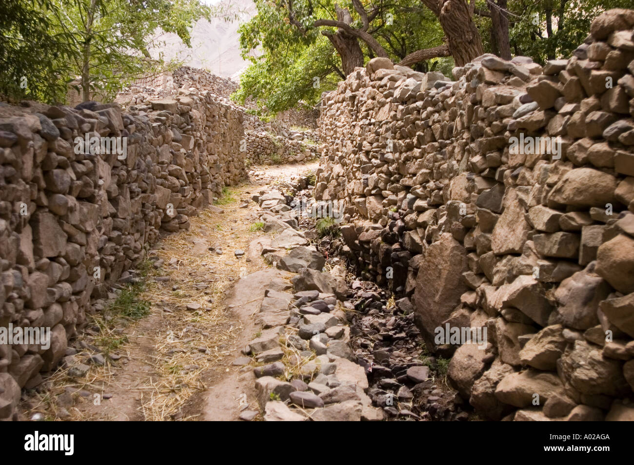 Street with rocky walls in Alchi village Ladakh India Stock Photo - Alamy