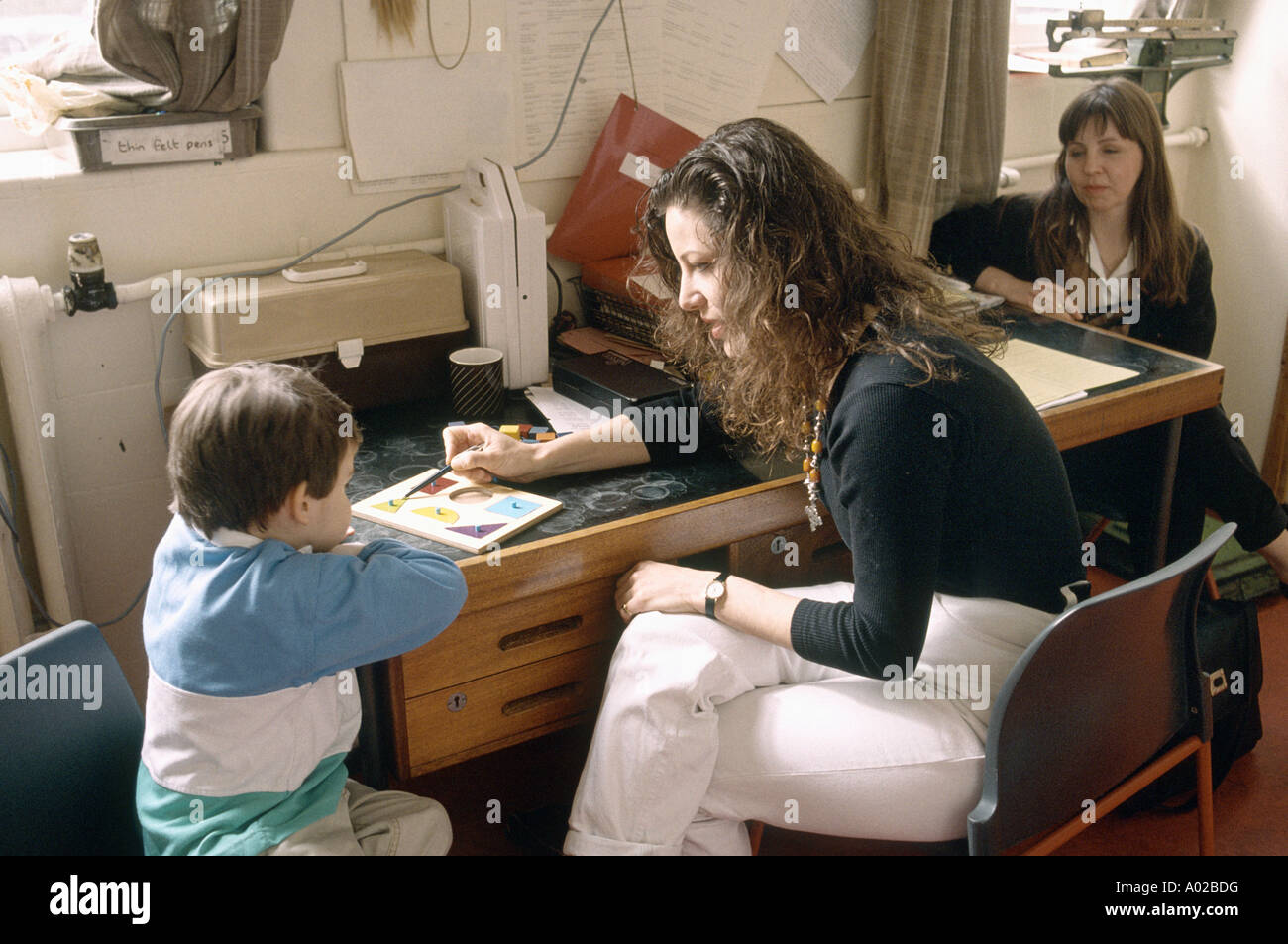School nurse testing a five year old boy Stock Photo - Alamy