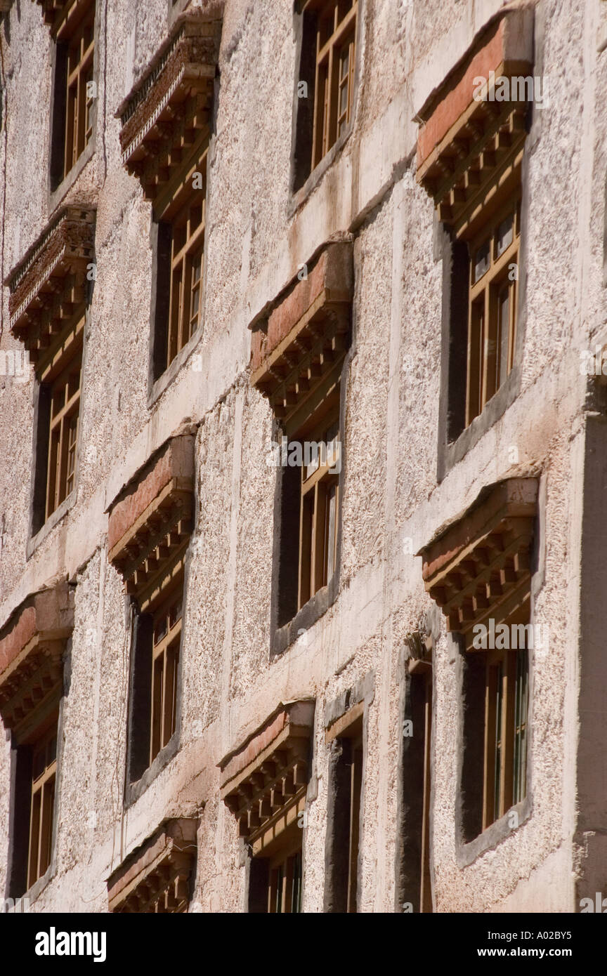 Traditional Ladhaki style windows in white building of Hemis monastery ...