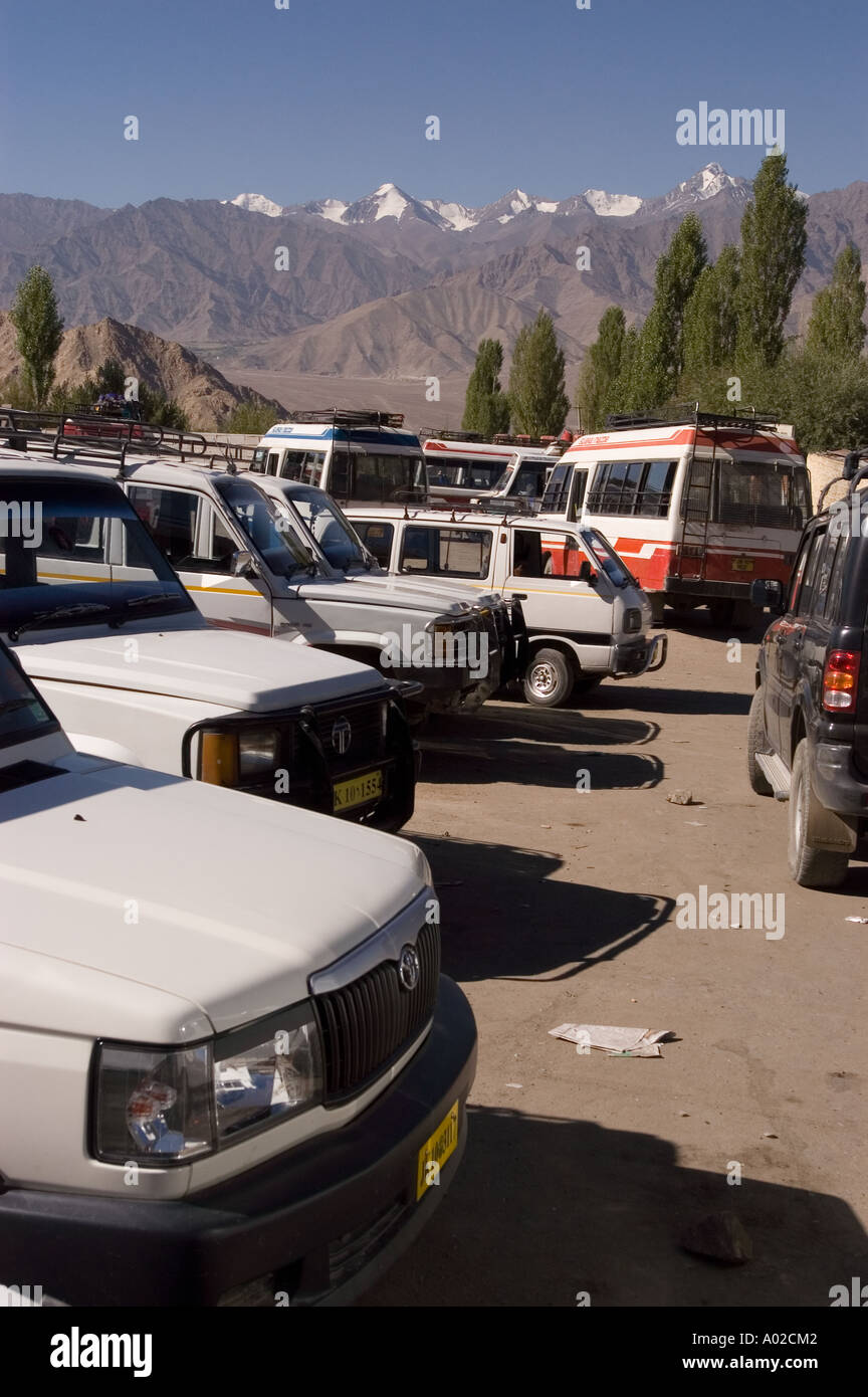Leh bus station with jeeps and Zanskar snow range in background Ladakh ...