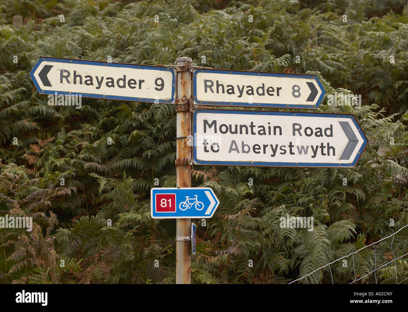 Road sign pointing to Rhayader in both directions on the mountain route ...