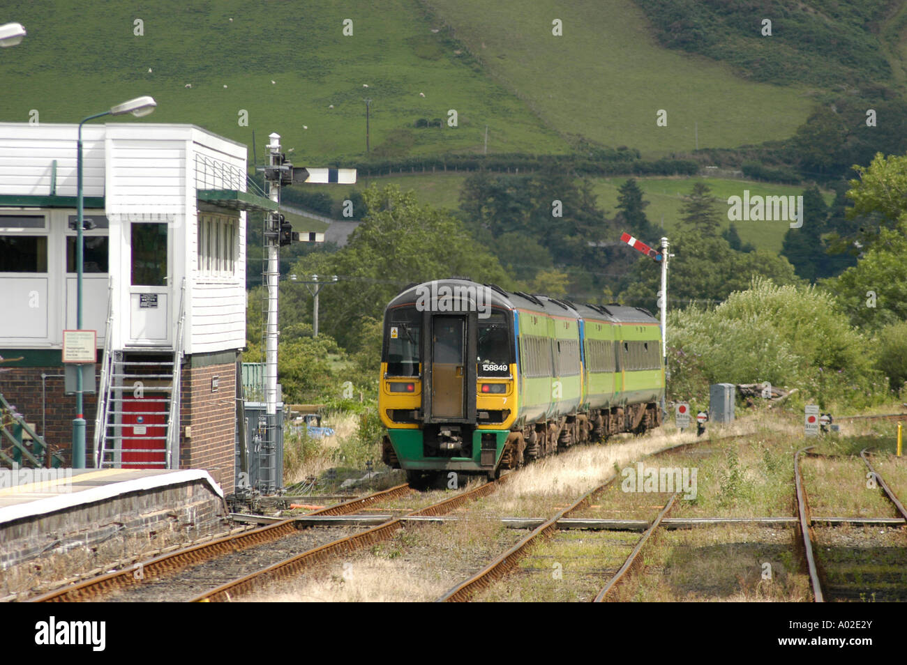 Arriva trains DMU diesel multiple unit train arriving at remote rural ...