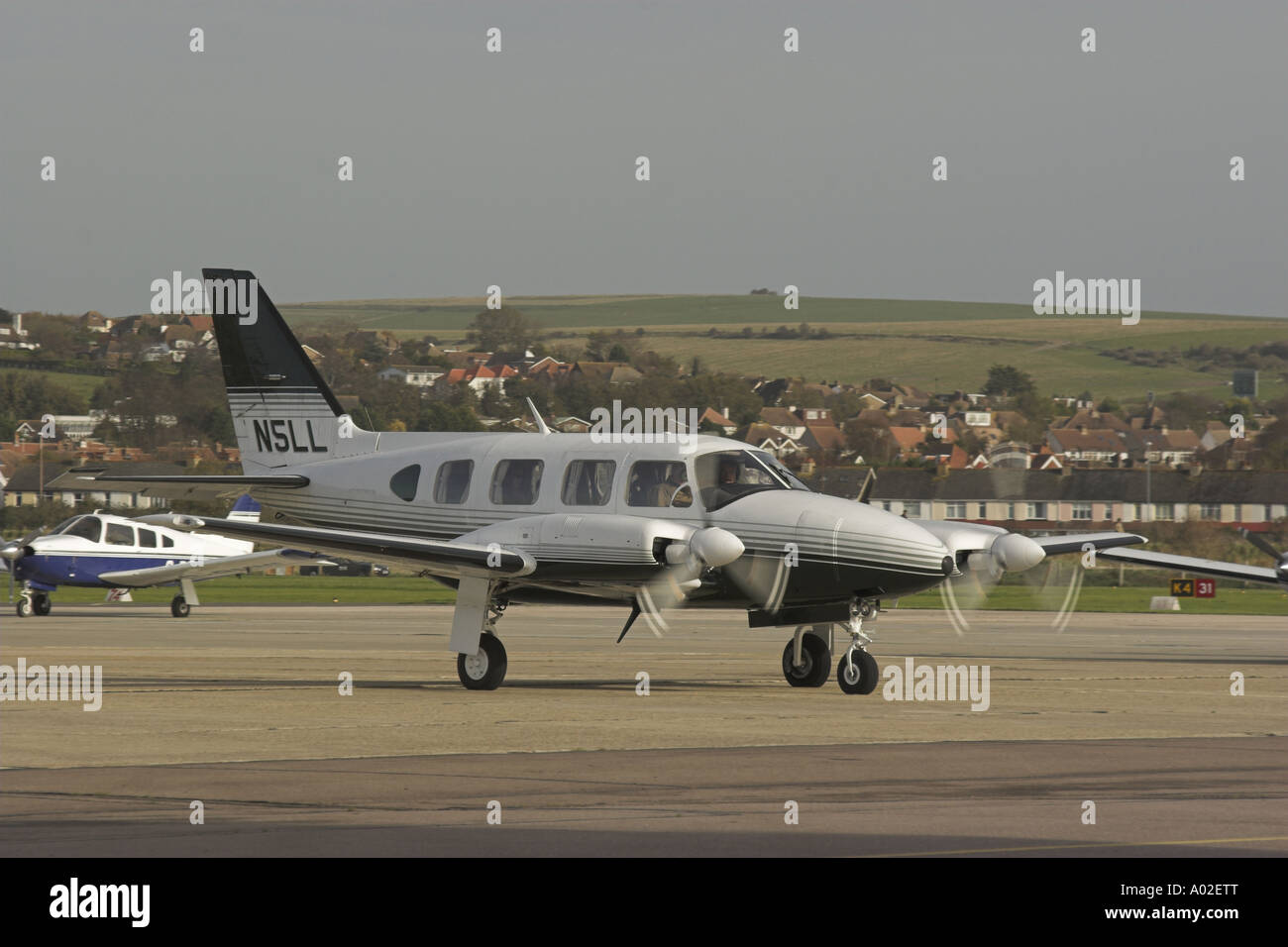 A Piper PA31-350 prepares for take-off at Shoreham (Brighton City ...