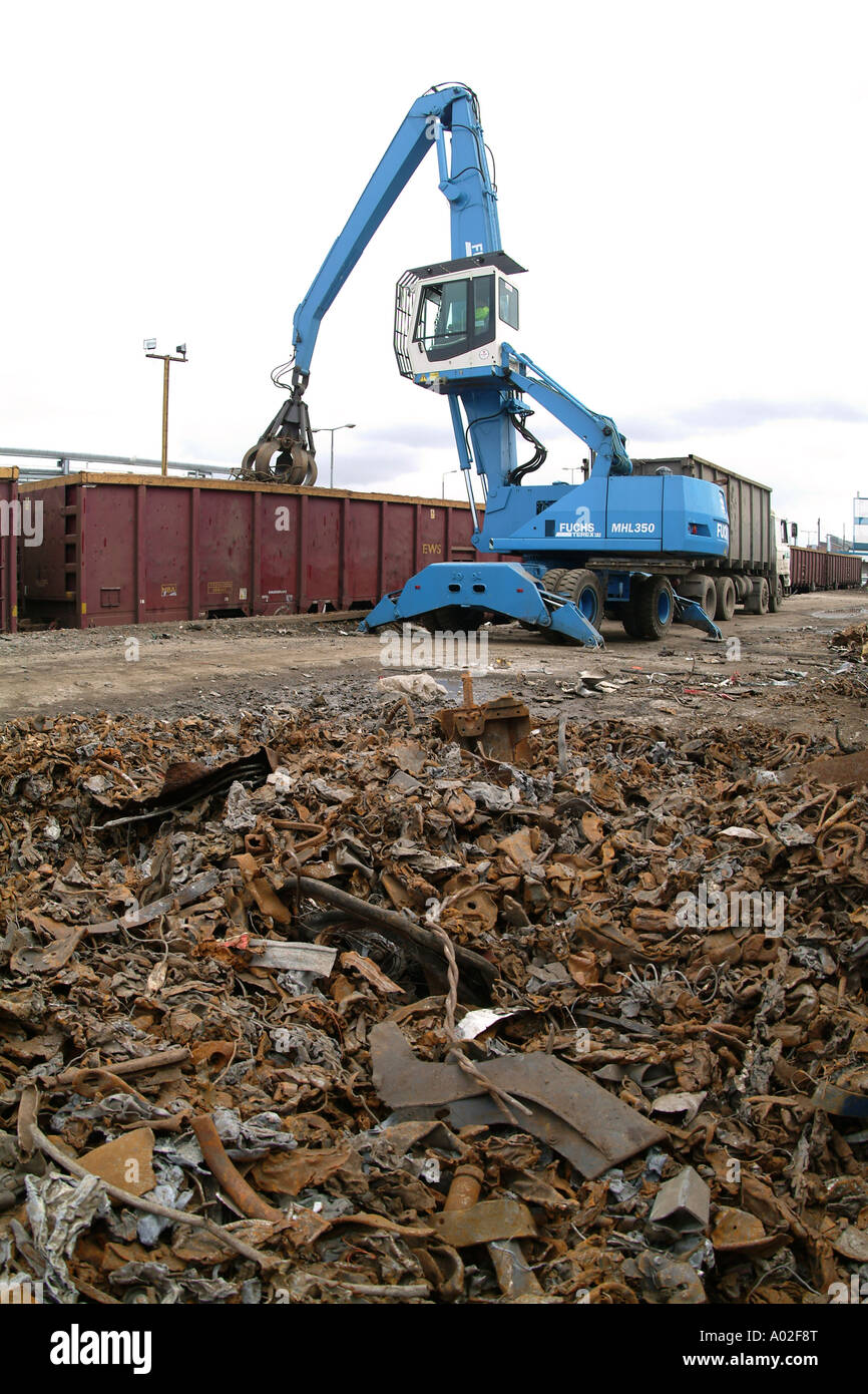 Fuchs MHL 350 loader unloading scrap metal from a train in the uk Stock ...