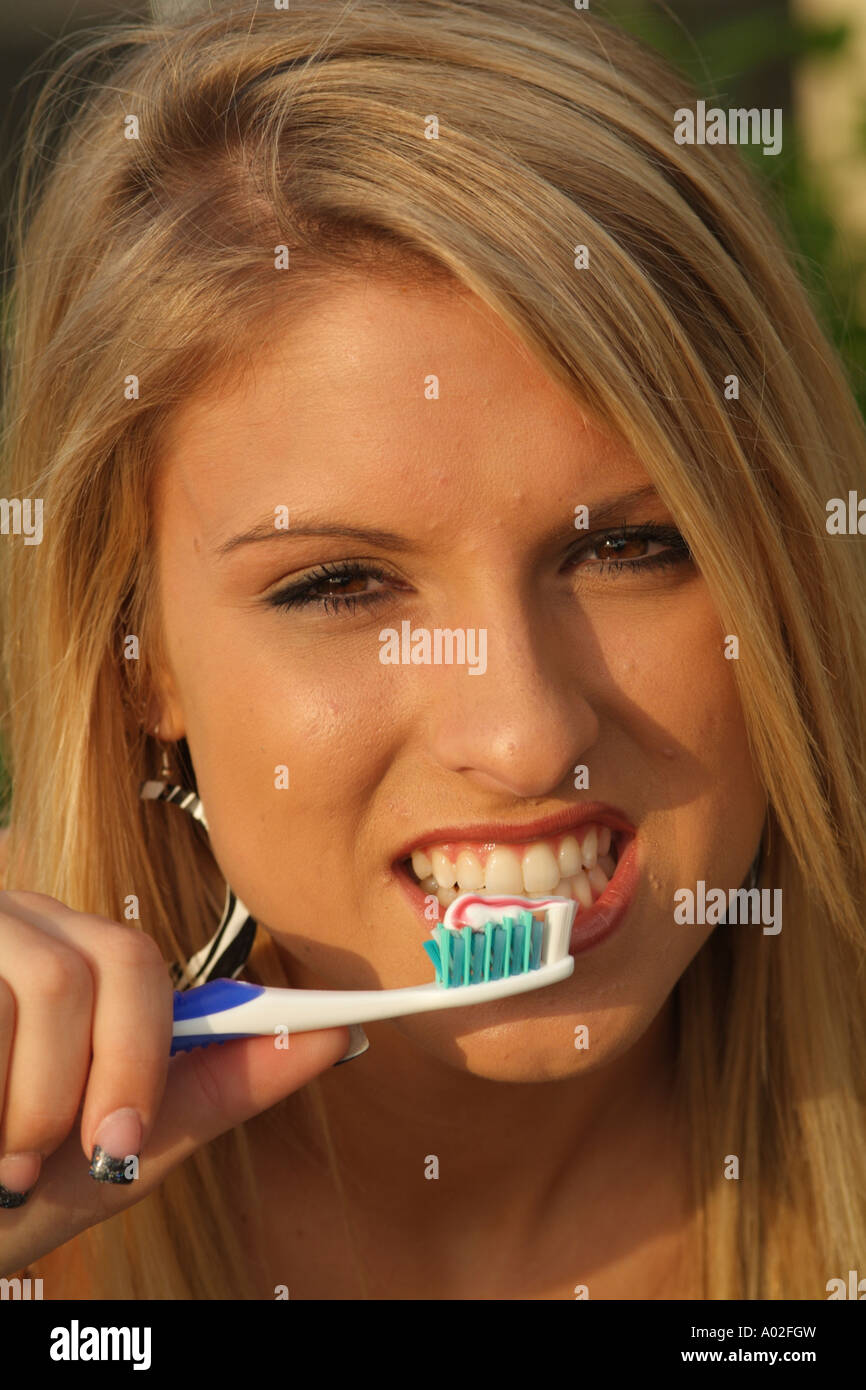 portrait of a teenager with toothpaste and brush Cleaning teeth Dental ...