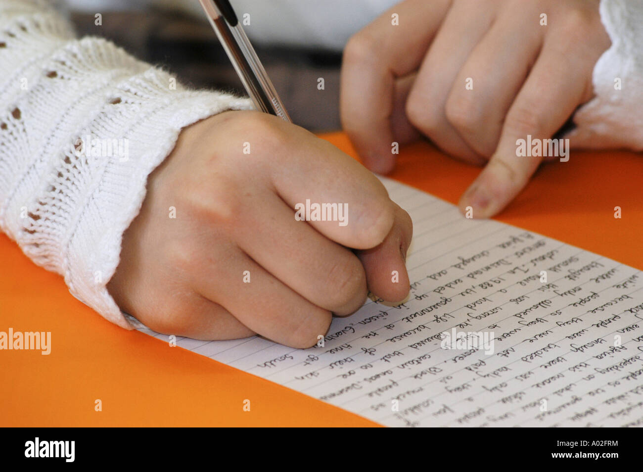 British school child writing hi-res stock photography and images - Alamy