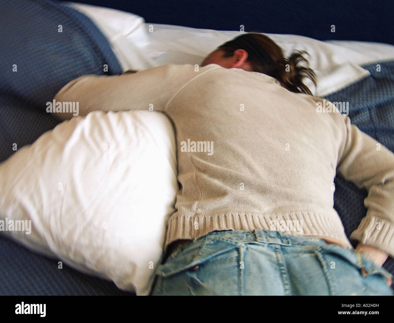 Girl sleeping on bed Stock Photo - Alamy