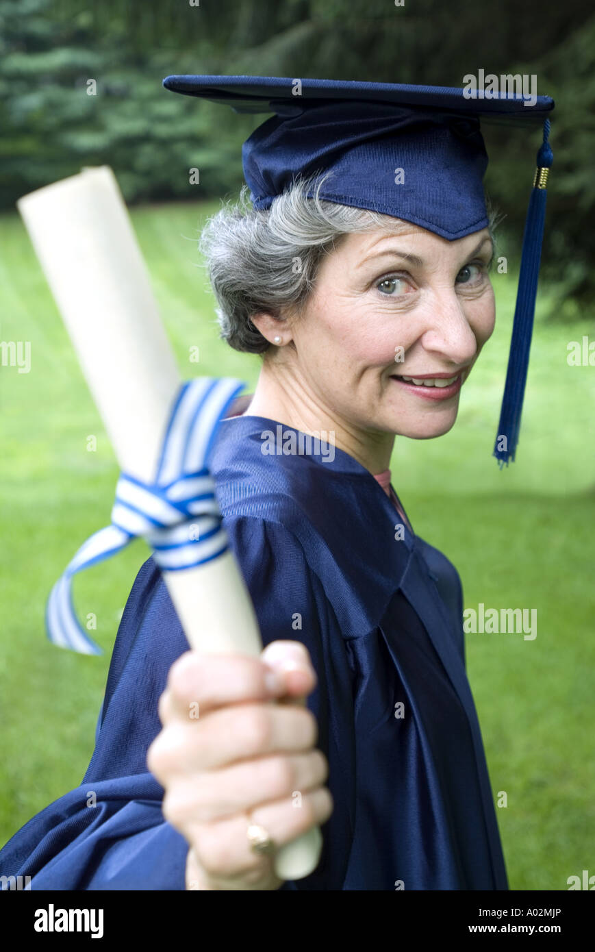 Senior woman college graduate with diploma Stock Photo - Alamy