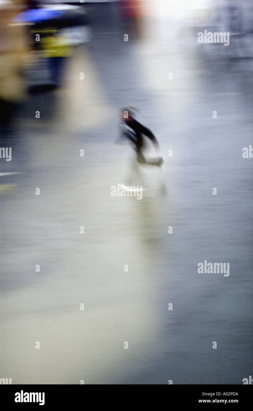 Person rushing across street hi-res stock photography and images - Alamy