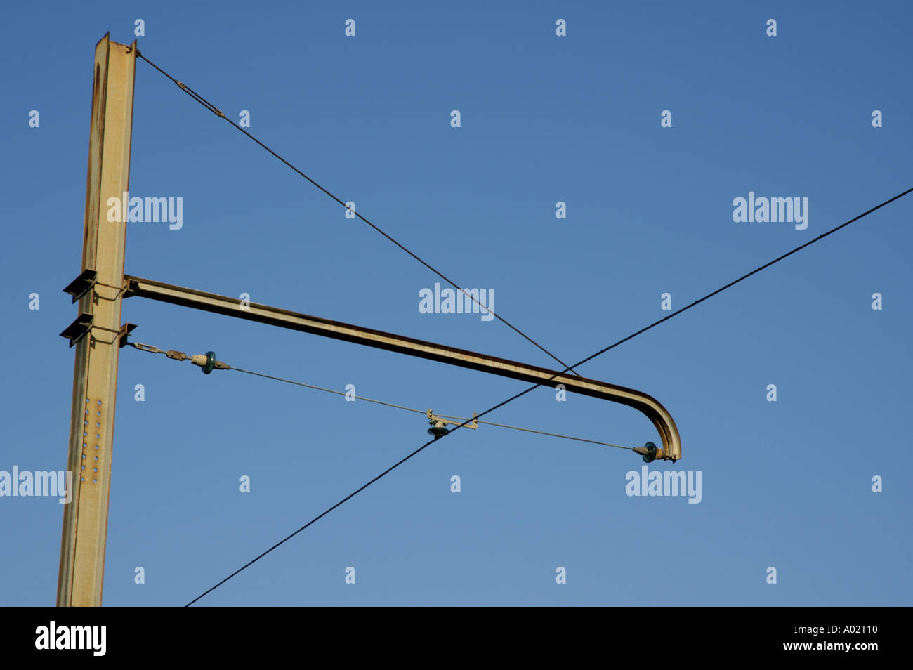 An electrical train pylon and wires Stock Photo - Alamy