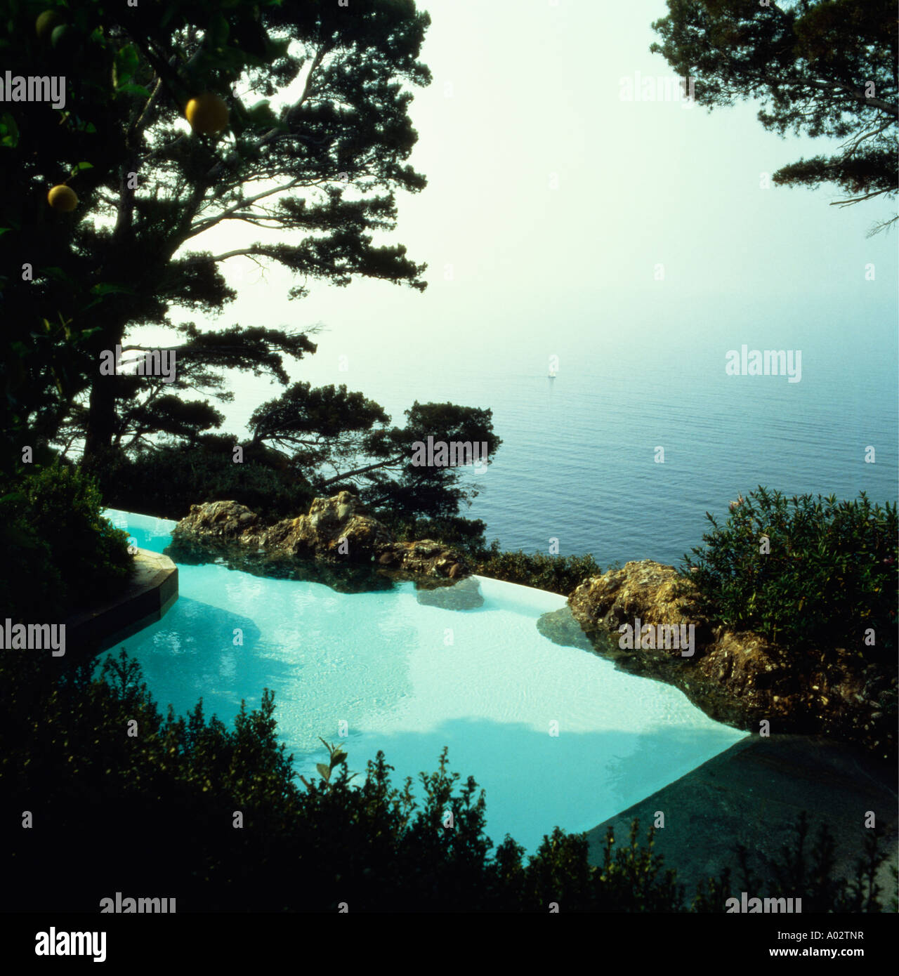 Infinity pool above sea on Italian coast Stock Photo - Alamy