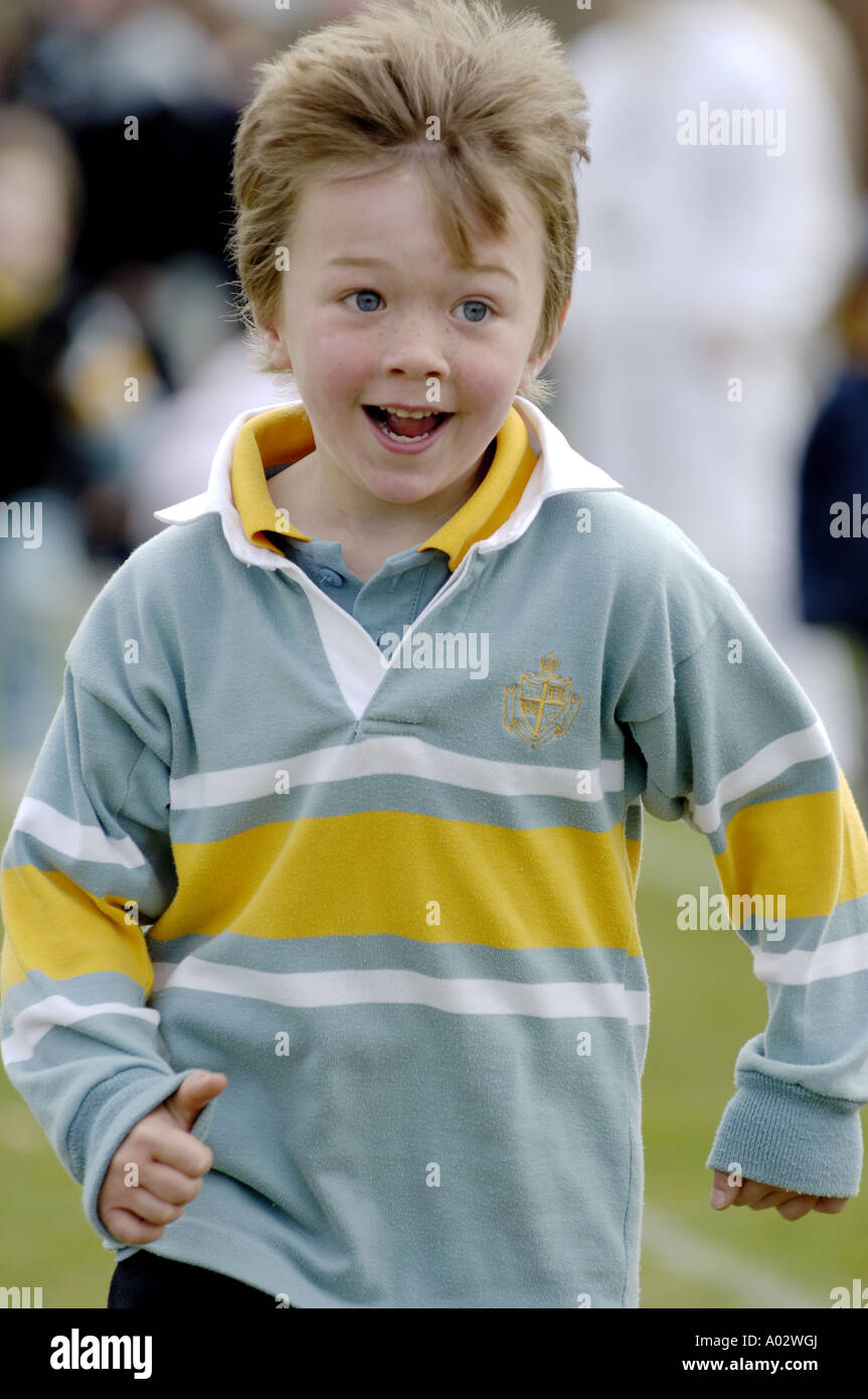 Young schoolboy enjoying athletics day Stock Photo - Alamy