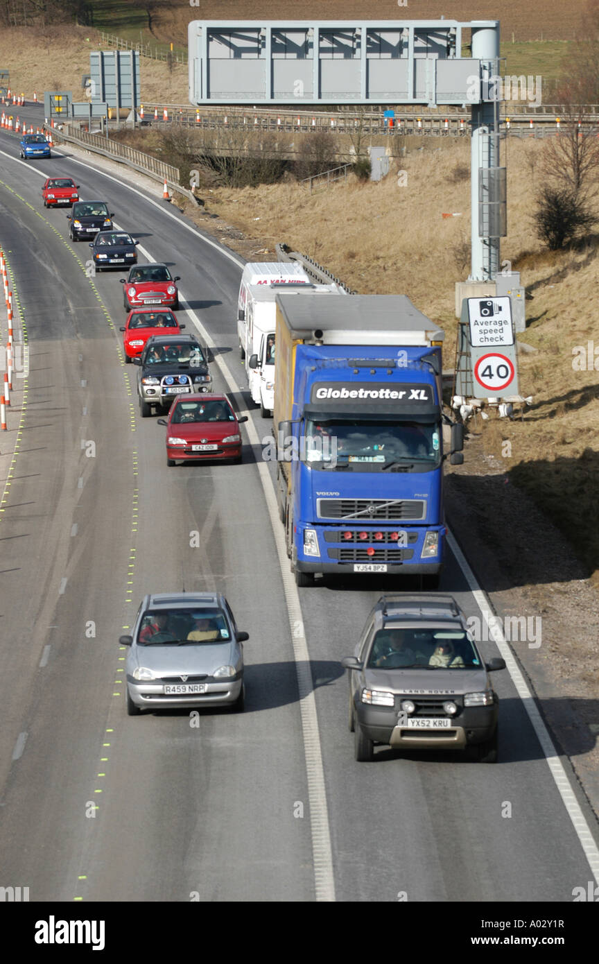 traffic travelling through roadworks on a uk motorway Stock Photo - Alamy