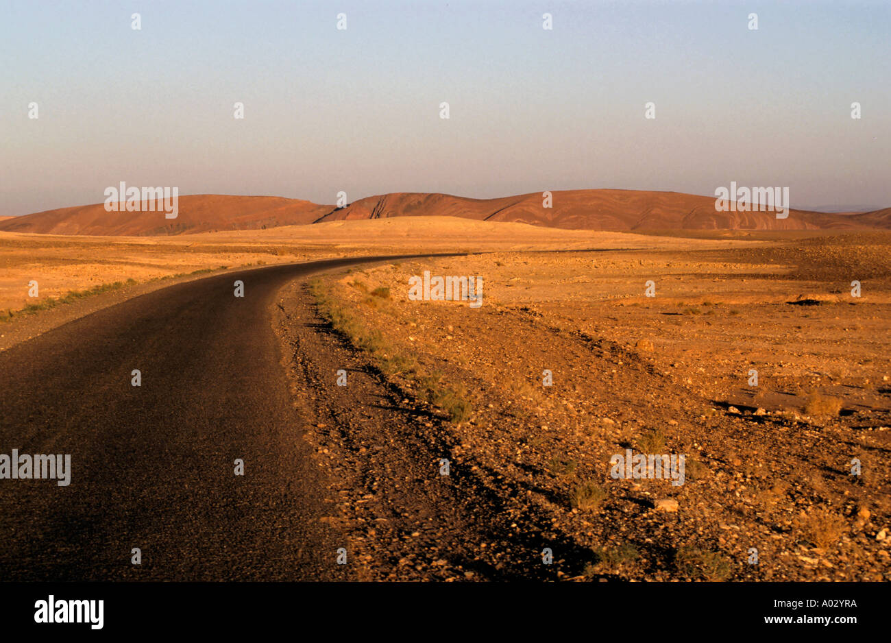 Curved Road In The Desert Stock Photo - Alamy