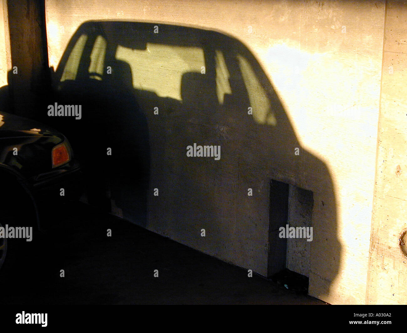Shadow of a parked car in a public parking garage in Seattle.WA Stock ...