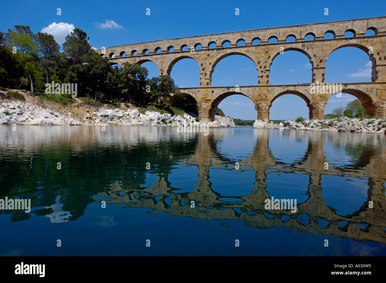 The Pont du Gard, an ancient Roman aqueduct bridge that crosses the ...