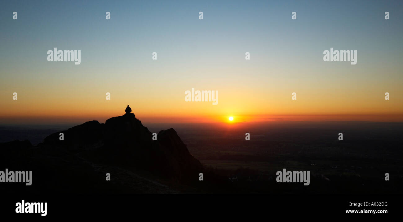 Silhouette Of A Man Watching The Sunset Mow Cop Staffordshire UK Stock ...