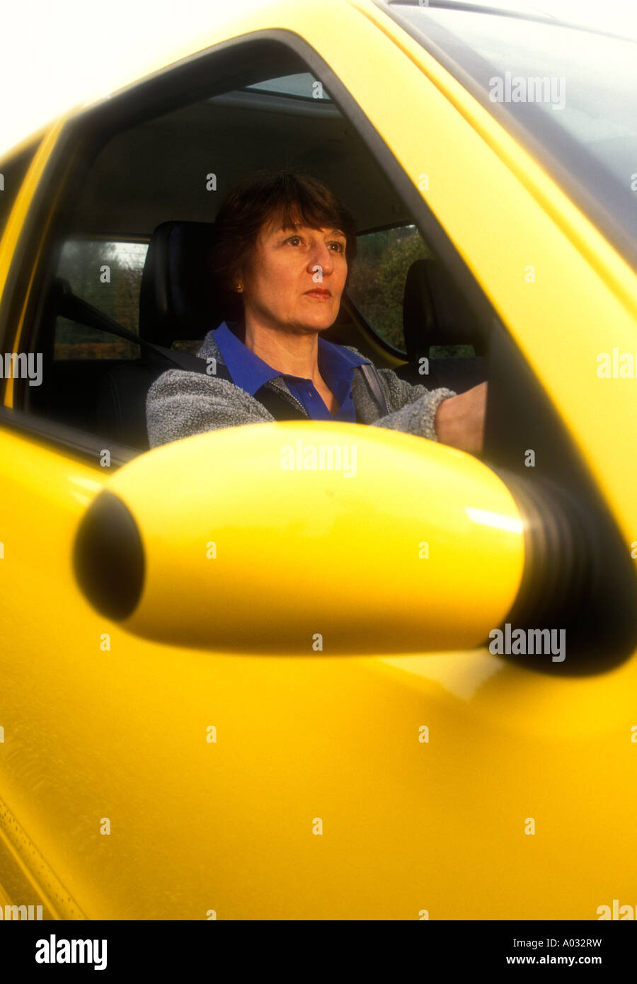 Lady driver in RHD car Stock Photo - Alamy