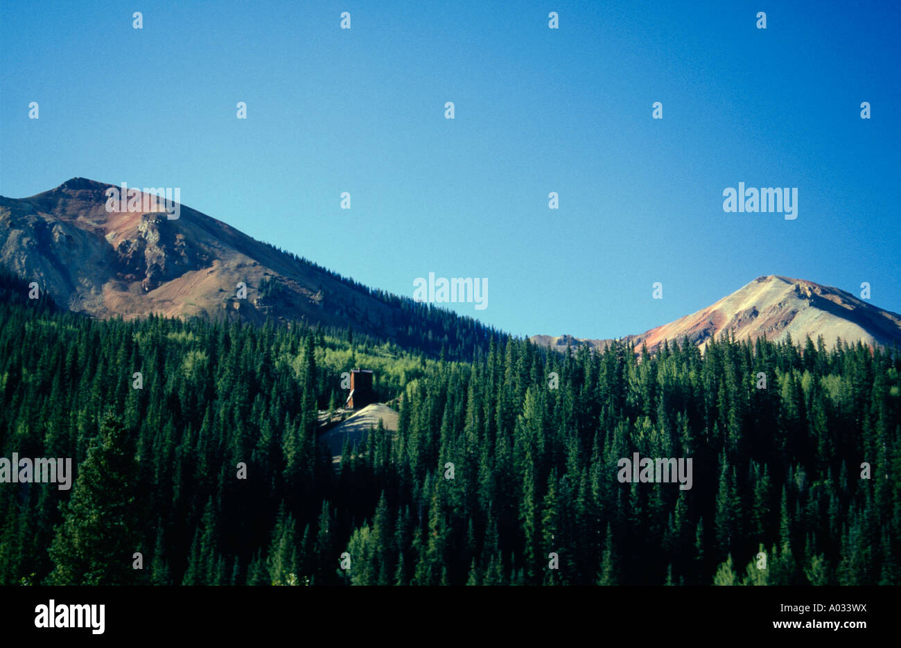 COLORADO Near Ouray wooden mine building on hillside Red Mountain in ...