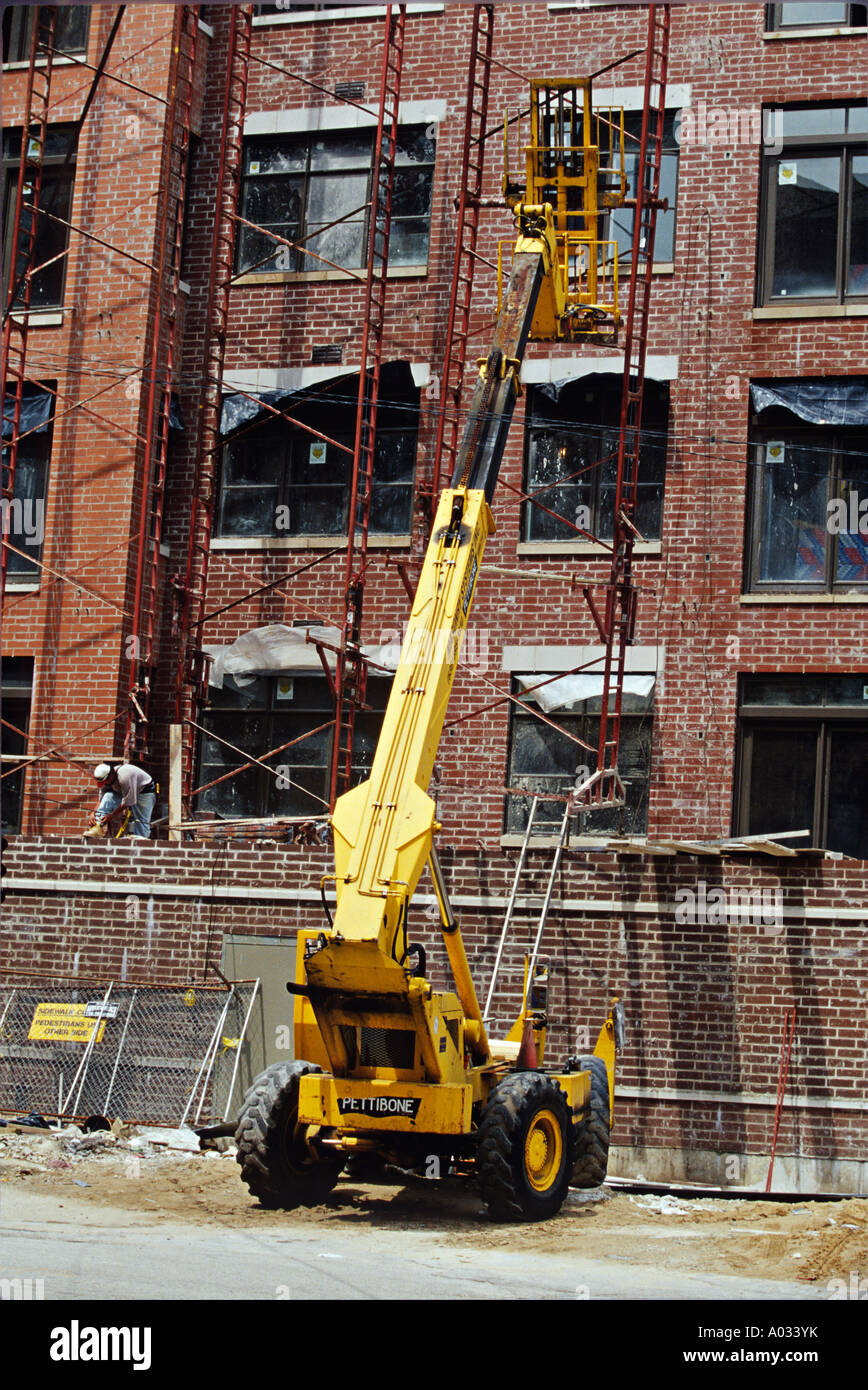WORKERS Chicago Illinois Forklift at residential construction site ...