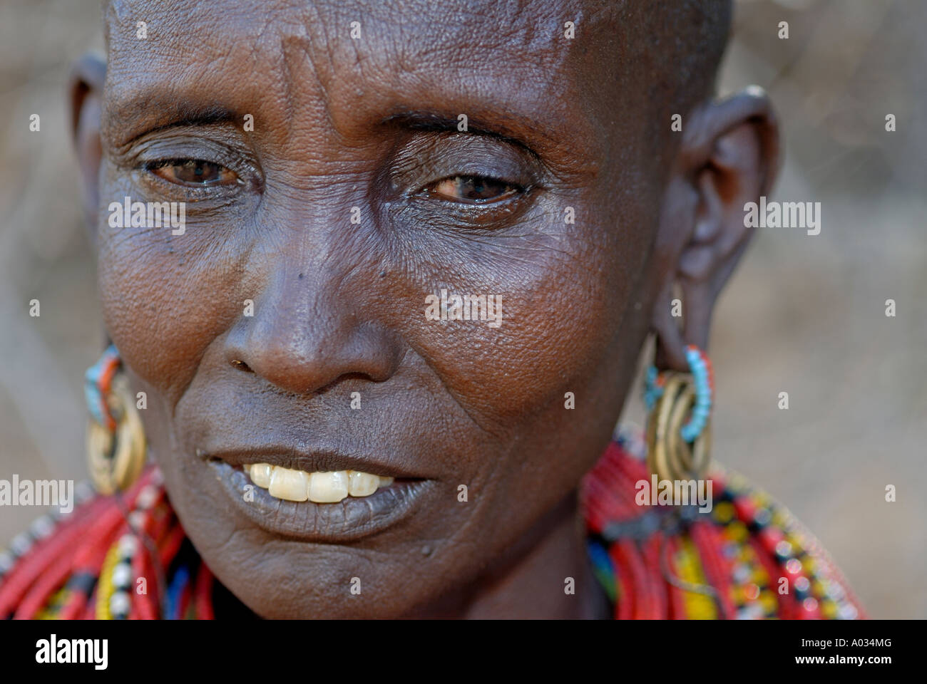 Sad Samburu woman wearing colorful tribal decorations Kenya Stock Photo ...