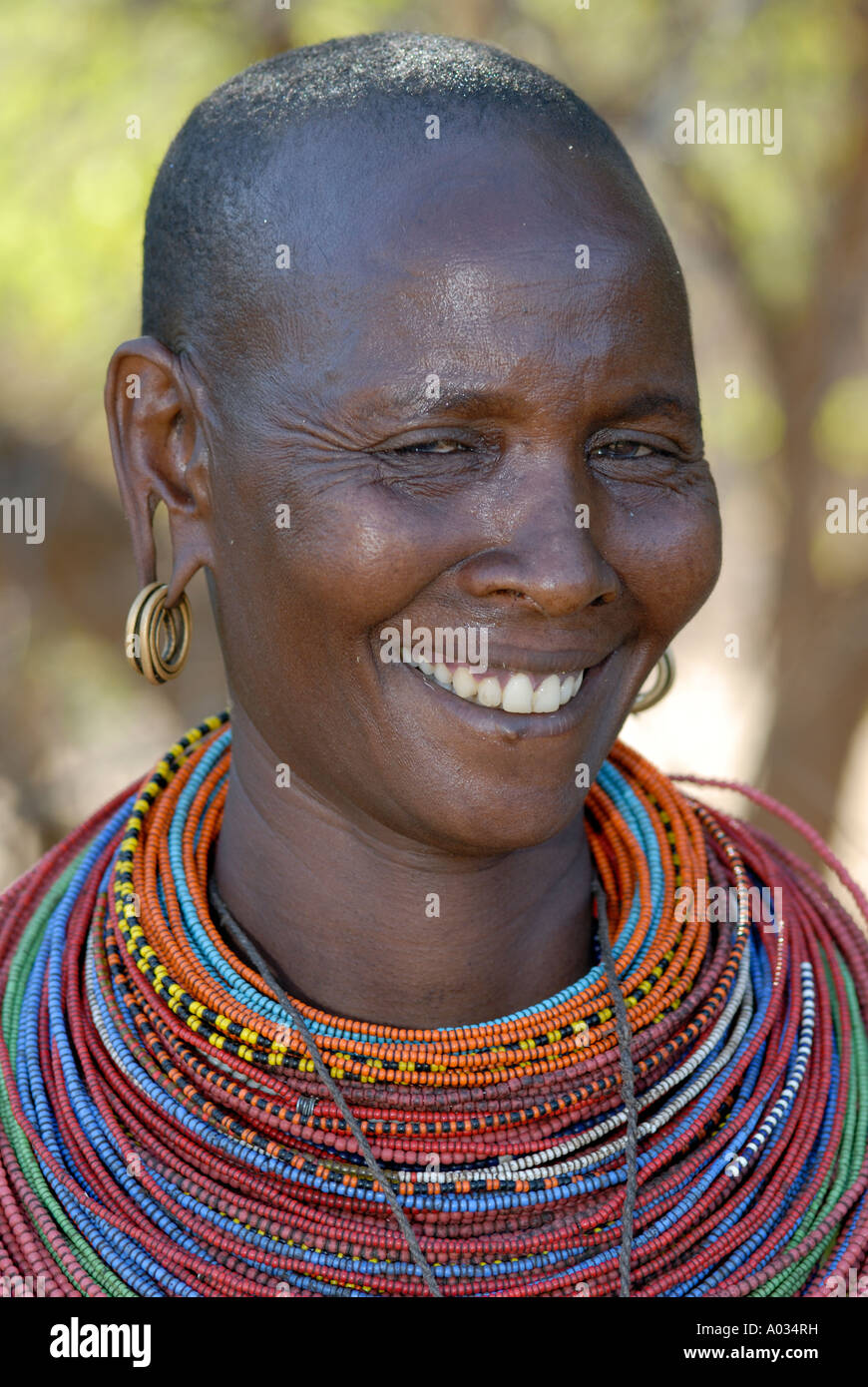 Smiling Samburu woman wearing colorful tribal decorations Kenya Stock ...