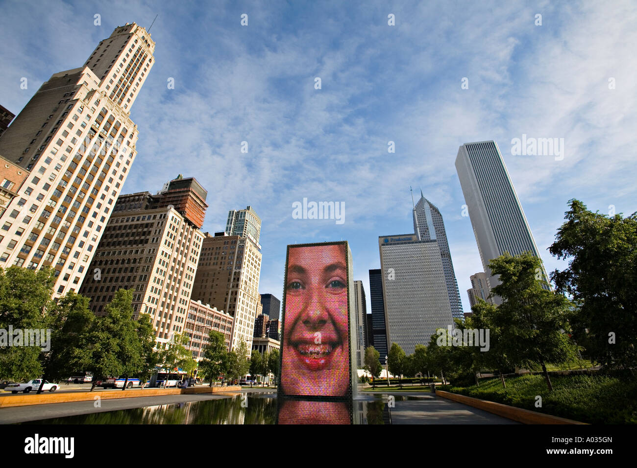ILLINOIS Chicago Smiling face on large video screen Crown Fountain in ...
