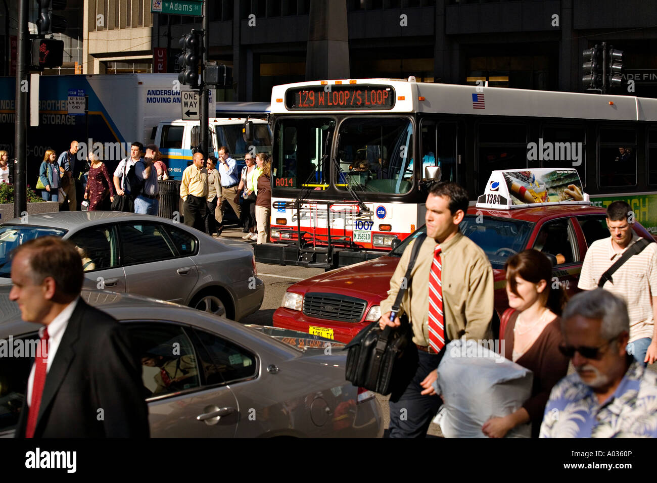 ILLINOIS Chicago Rush hour street and pedestrian traffic in late ...