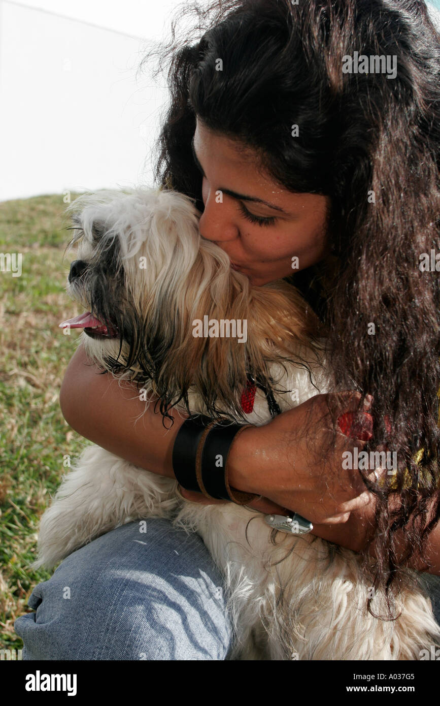 Dog owner hispanic woman female women hi-res stock photography and ...