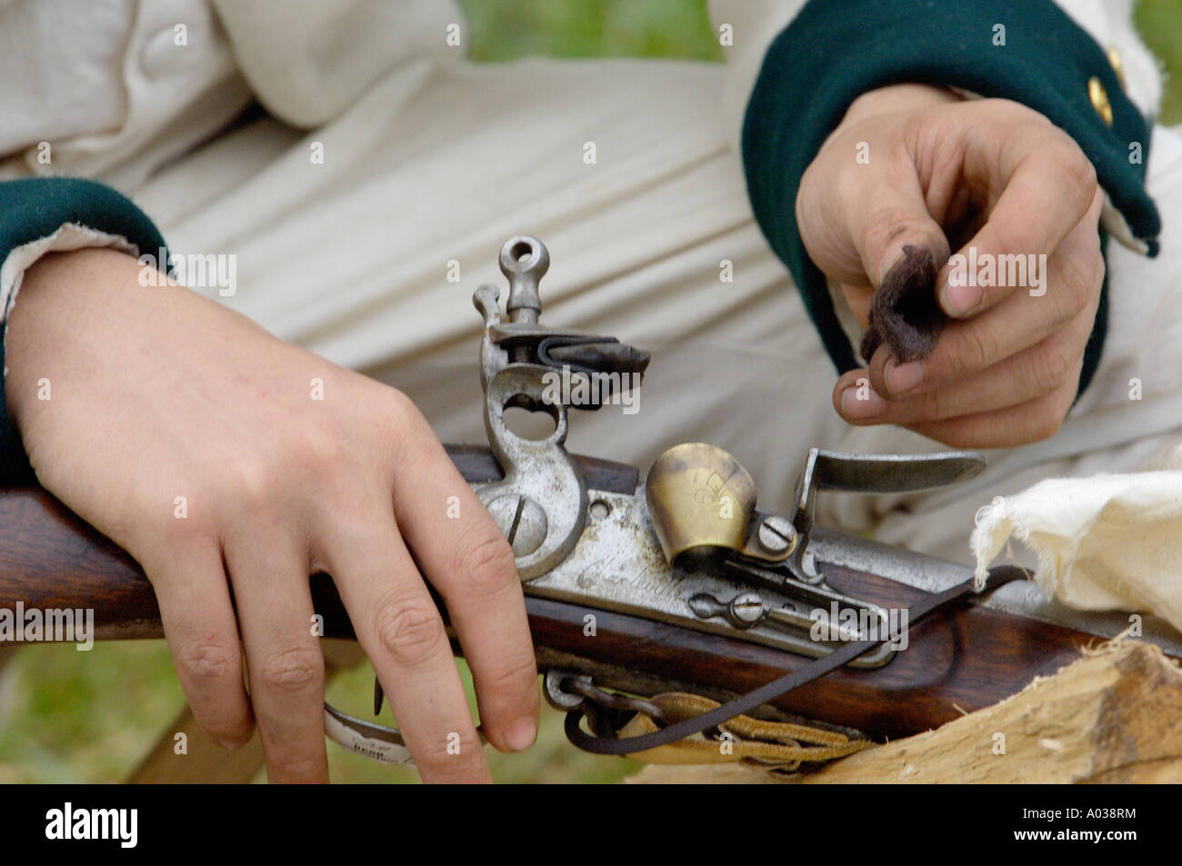 French soldier cleaning his musket at a reenactment on the Yorktown ...