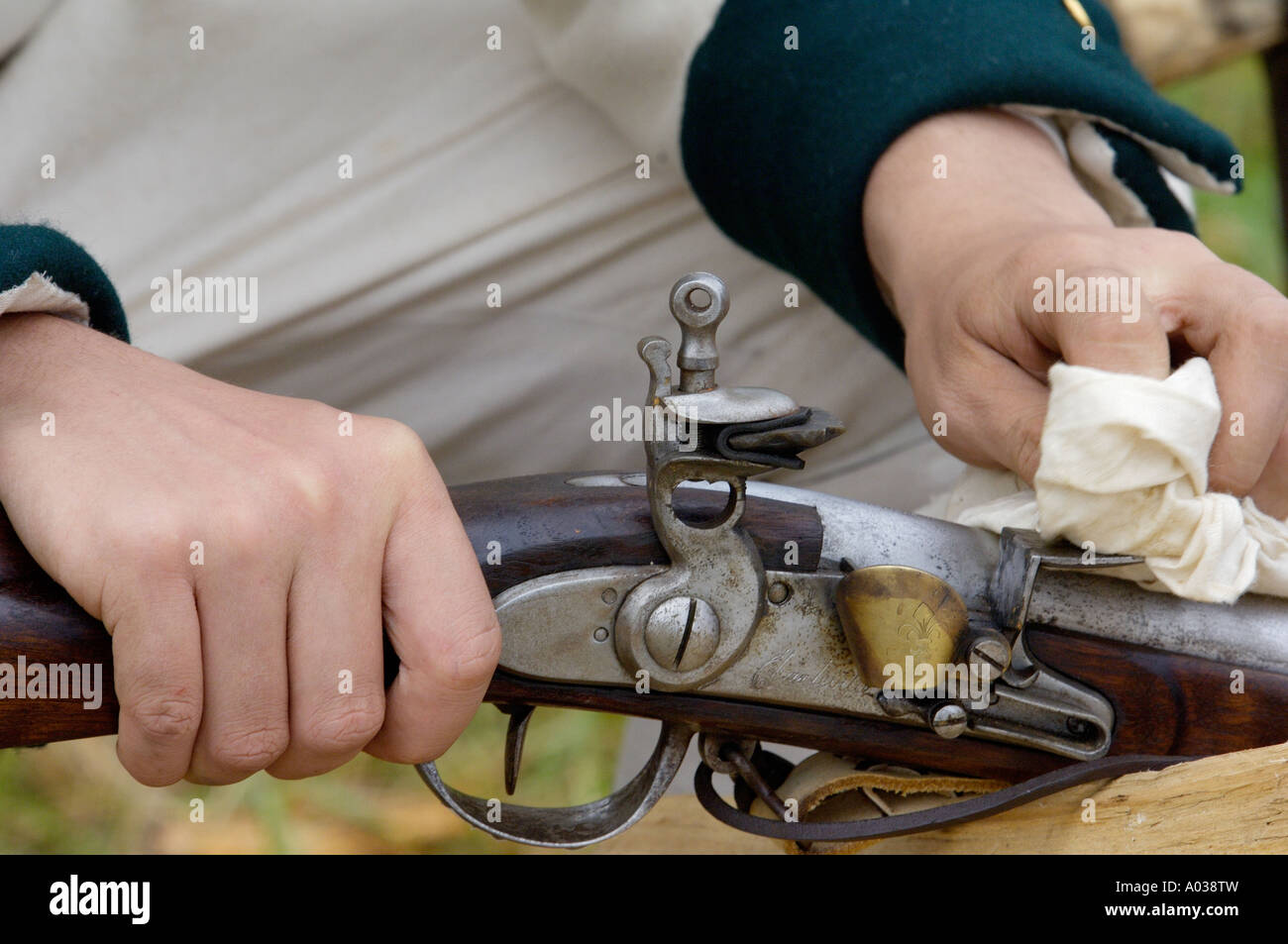 French soldier cleaning his musket at a reenactment on the Yorktown ...