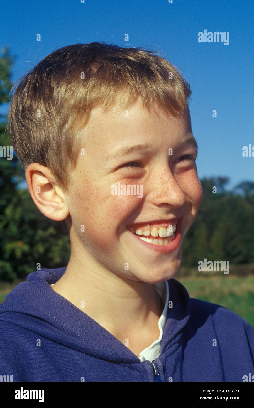 portrait of a laughing young boy with freckles Stock Photo - Alamy
