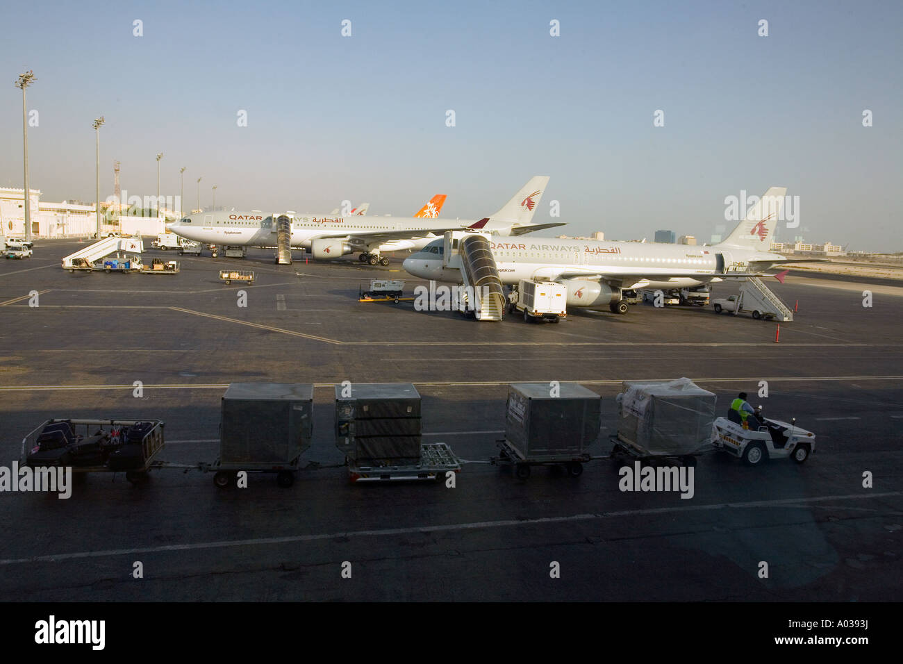 Qatar airlines planes at Doha airport Stock Photo - Alamy