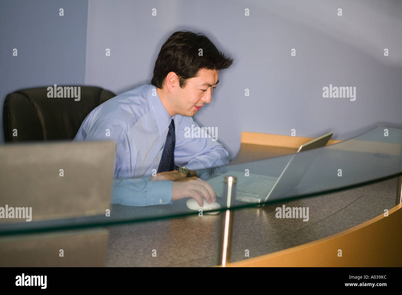 Businessman woman sitting reception desk hi-res stock photography and ...