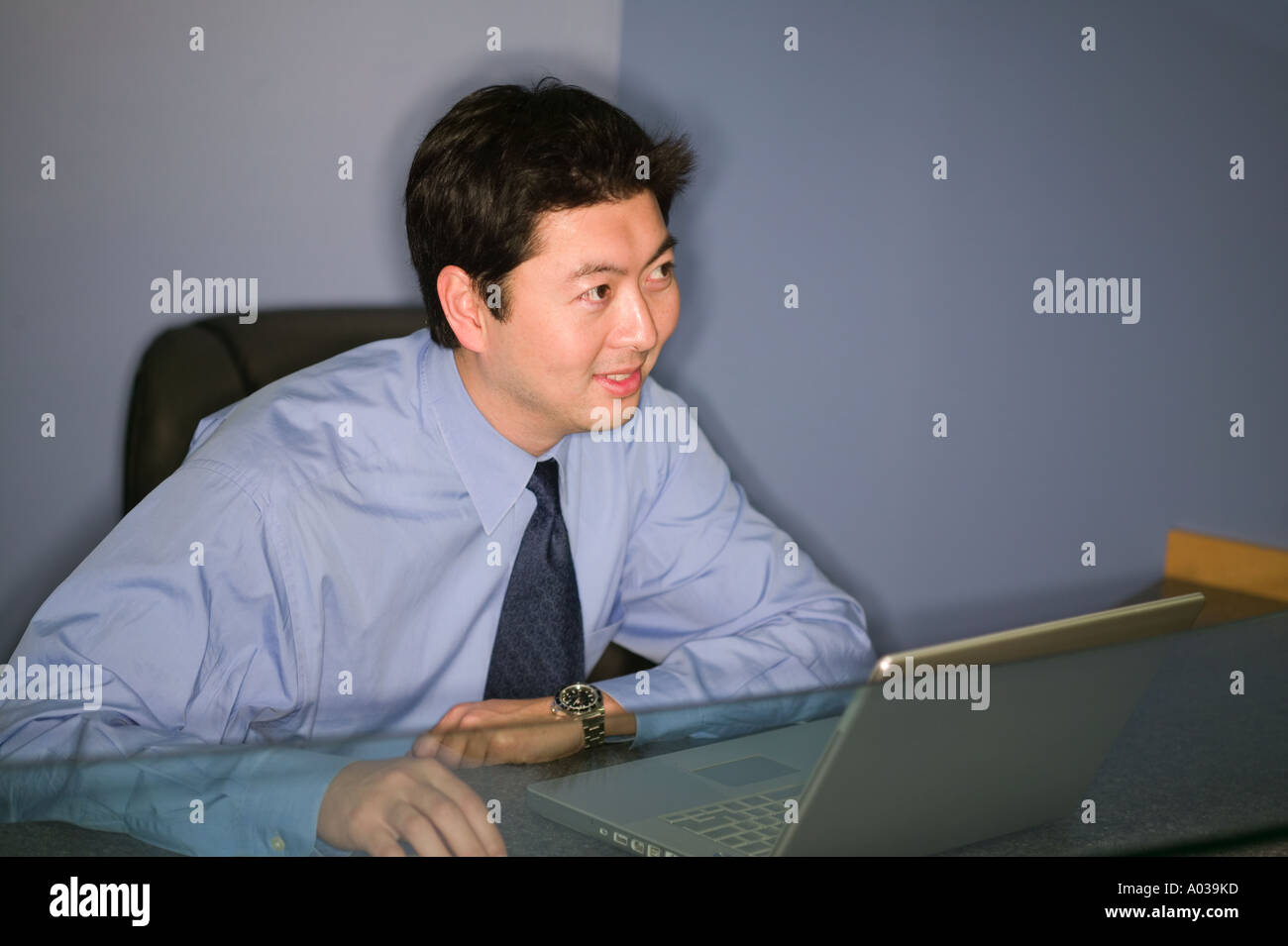Asian male reception desk hi-res stock photography and images - Alamy