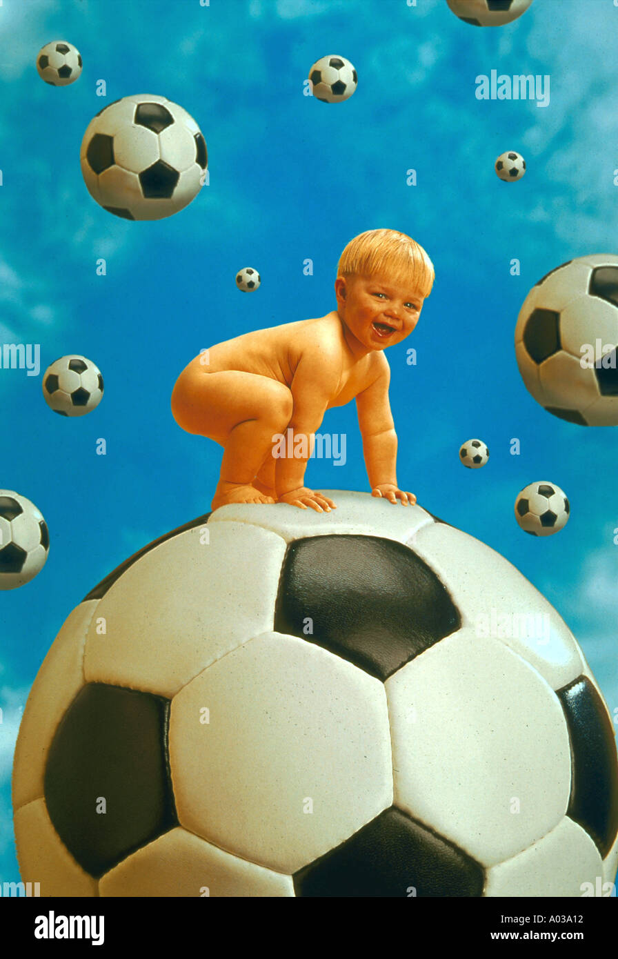 baby on football champion Stock Photo - Alamy