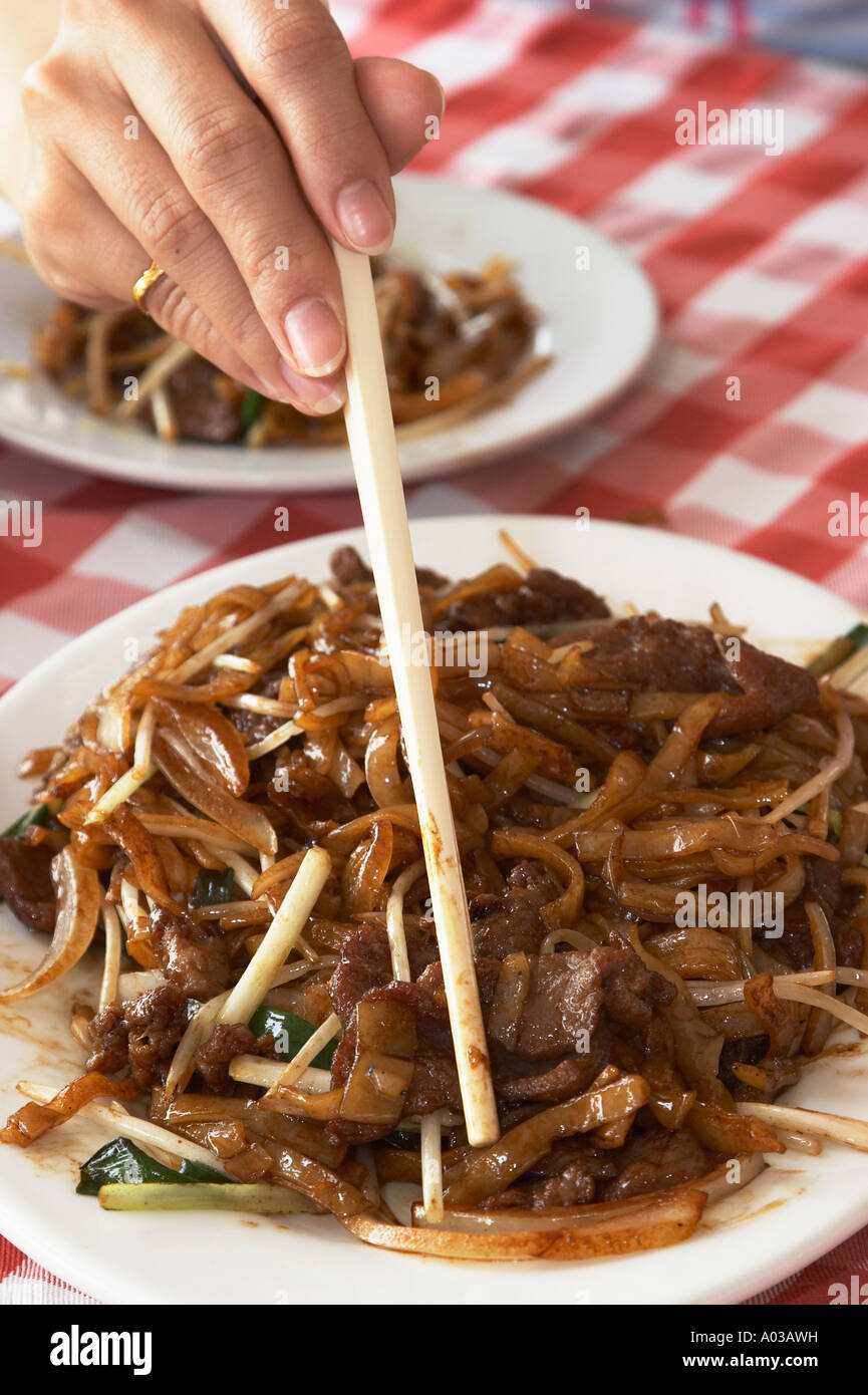 Chopsticks Being Used By Woman, Hong Kong Stock Photo - Alamy