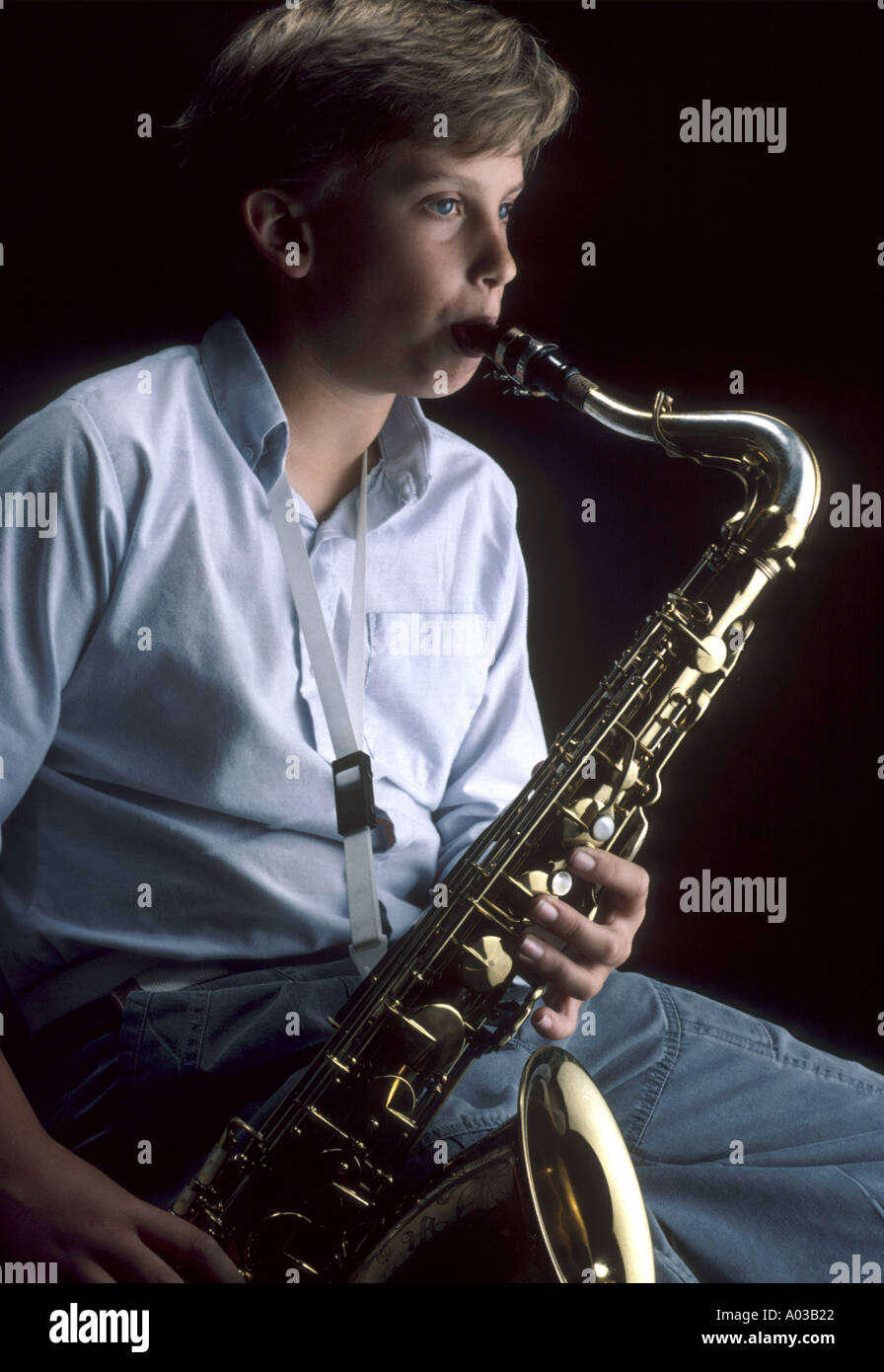 Boy Playing Tenor Saxaphone Stock Photo - Alamy